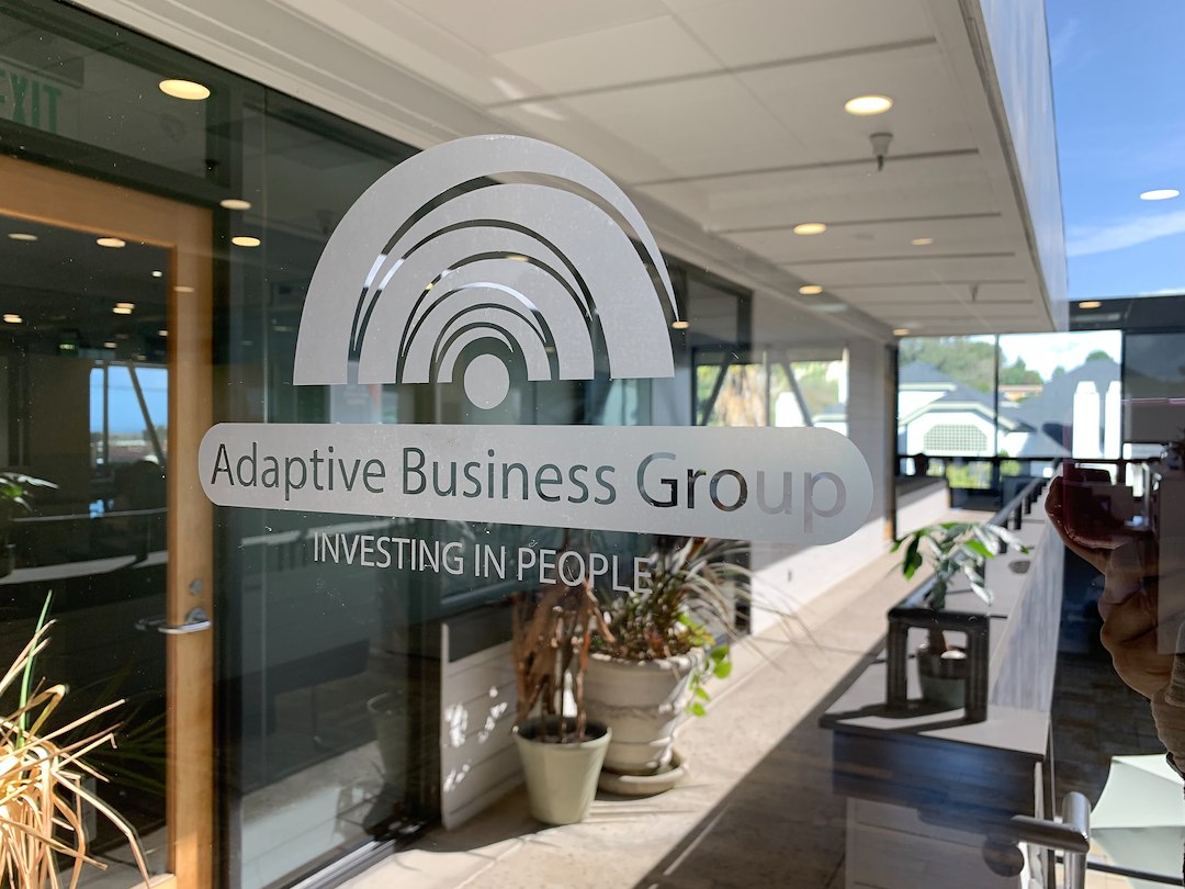 ADAPTIVE BUSINESS GROUP FROST FILM INSTALLATION & LOGO INSTALL